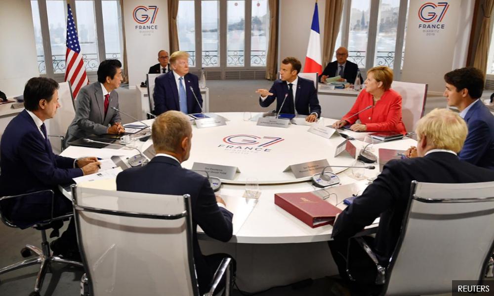 Trump caught off guard as Iranian minister visits G7 summit