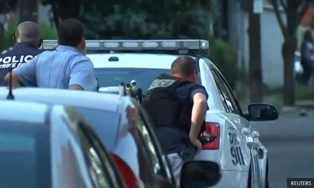 Swat team rescues police trapped in Philadelphia shootout